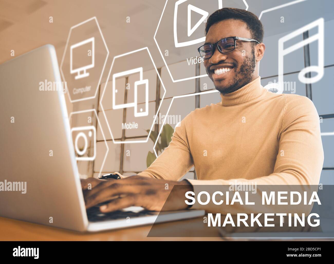 Smiling African American influencer with laptop broadcasting online ...