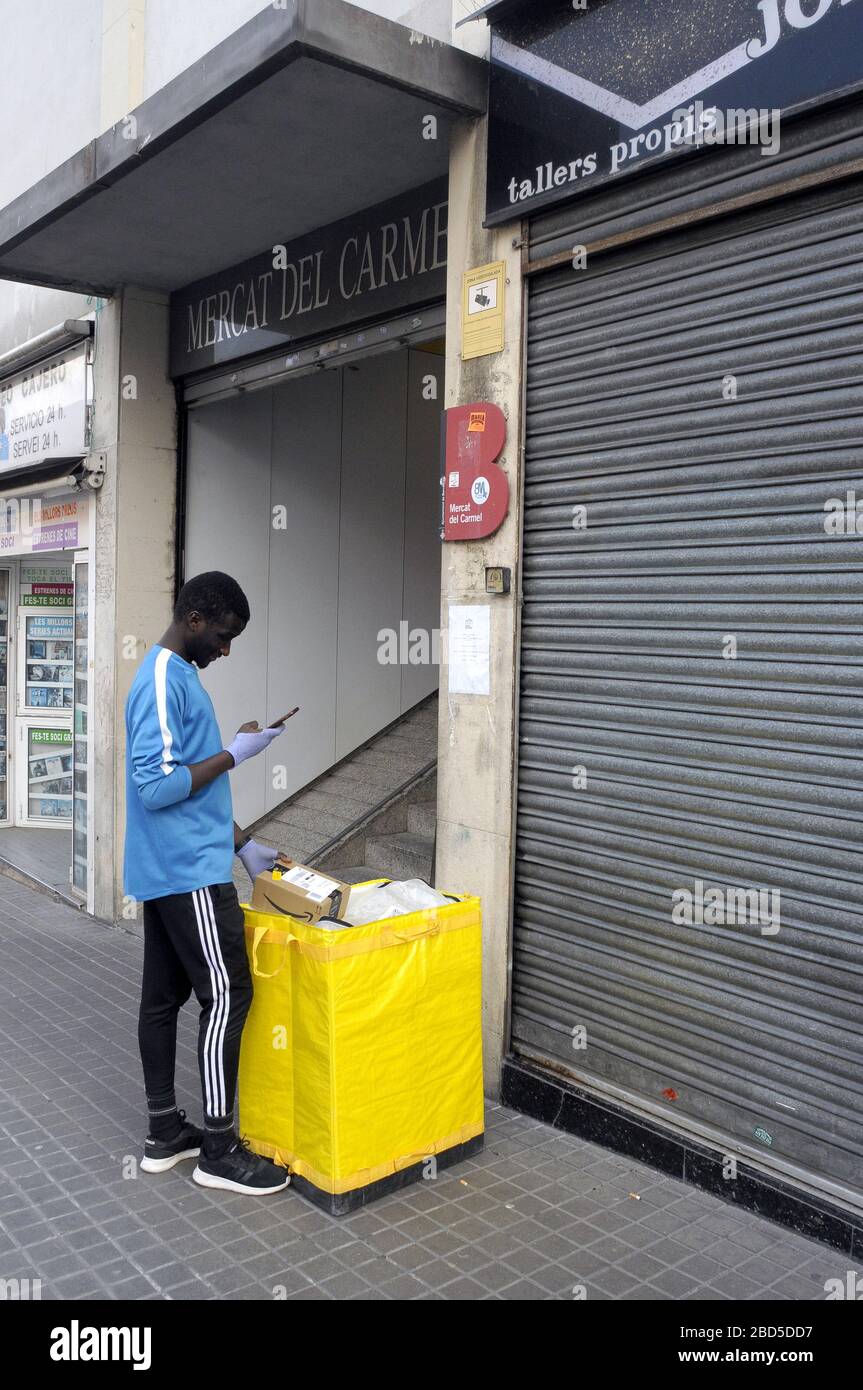 young Amazon delivery man at mercat del Carmel Barcelona,Spain Stock ...