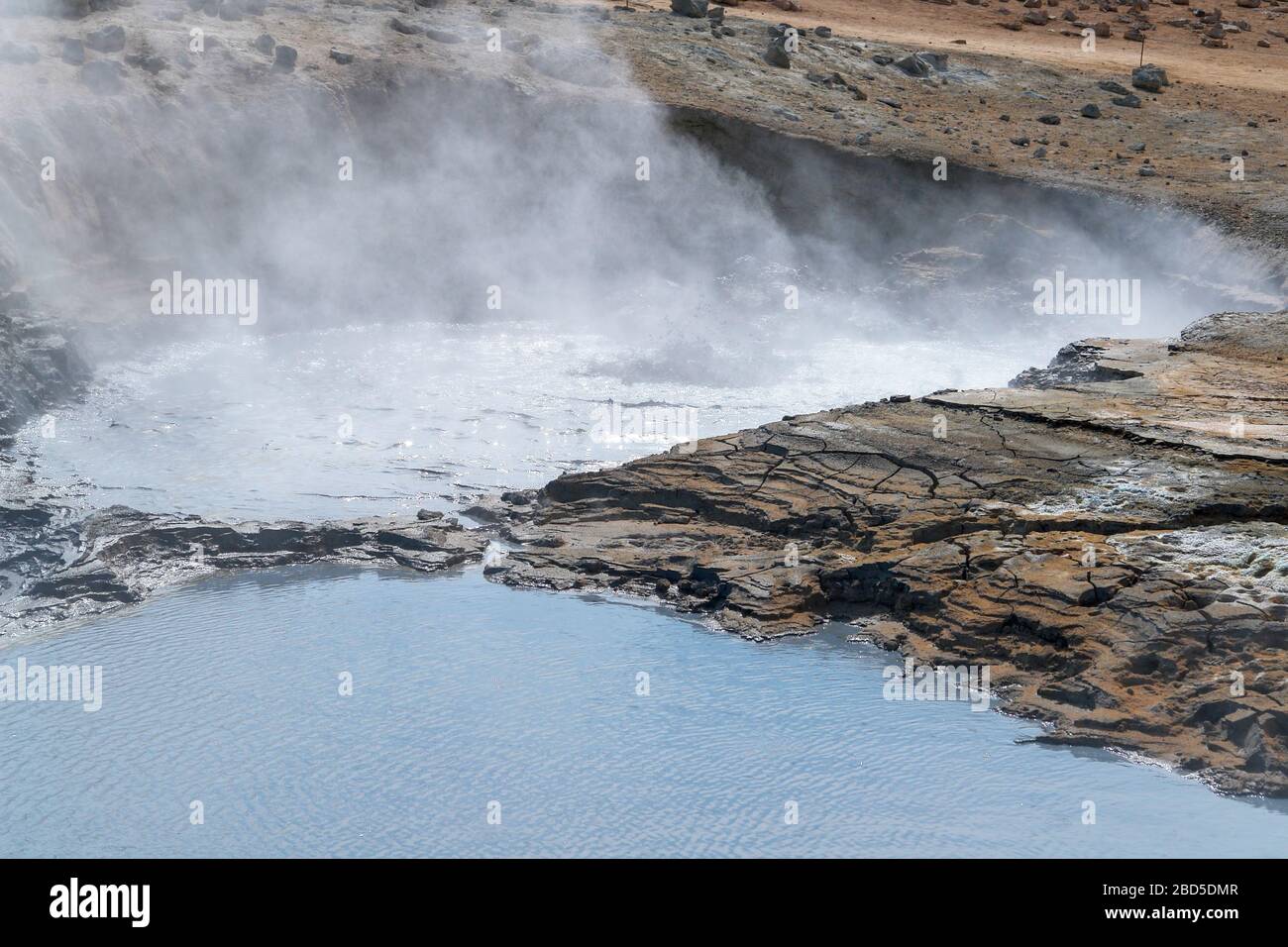 Boiling mud pool in Namafjall Hverir Geothermal Area - Iceland Stock ...