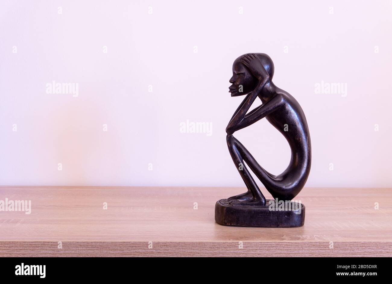 Luanda, Angola - April 04th 2020: Wood carving statue of The Thinker (O ...