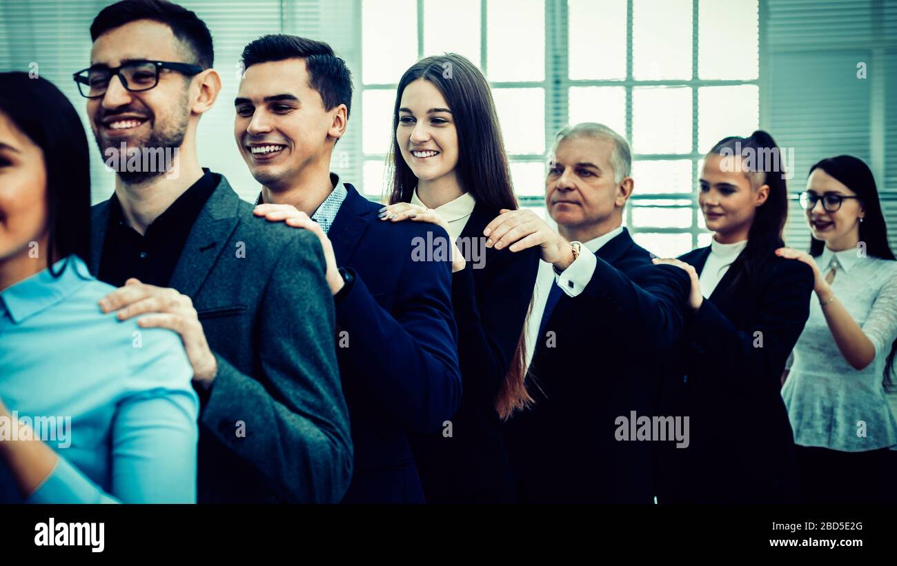 group of corporate employees standing behind each other Stock Photo - Alamy