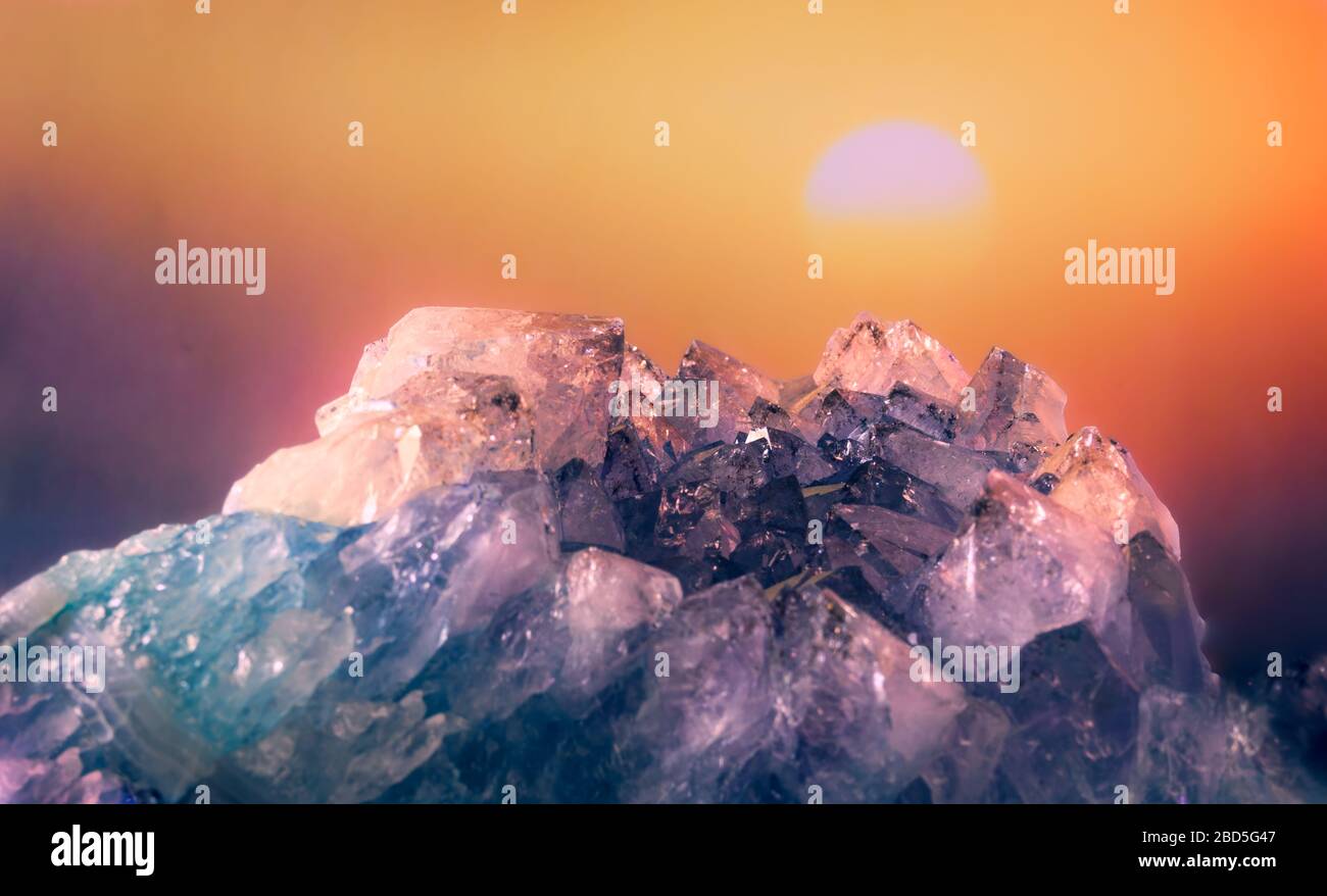 Quartz Geode crystals with sunset background Stock Photo - Alamy