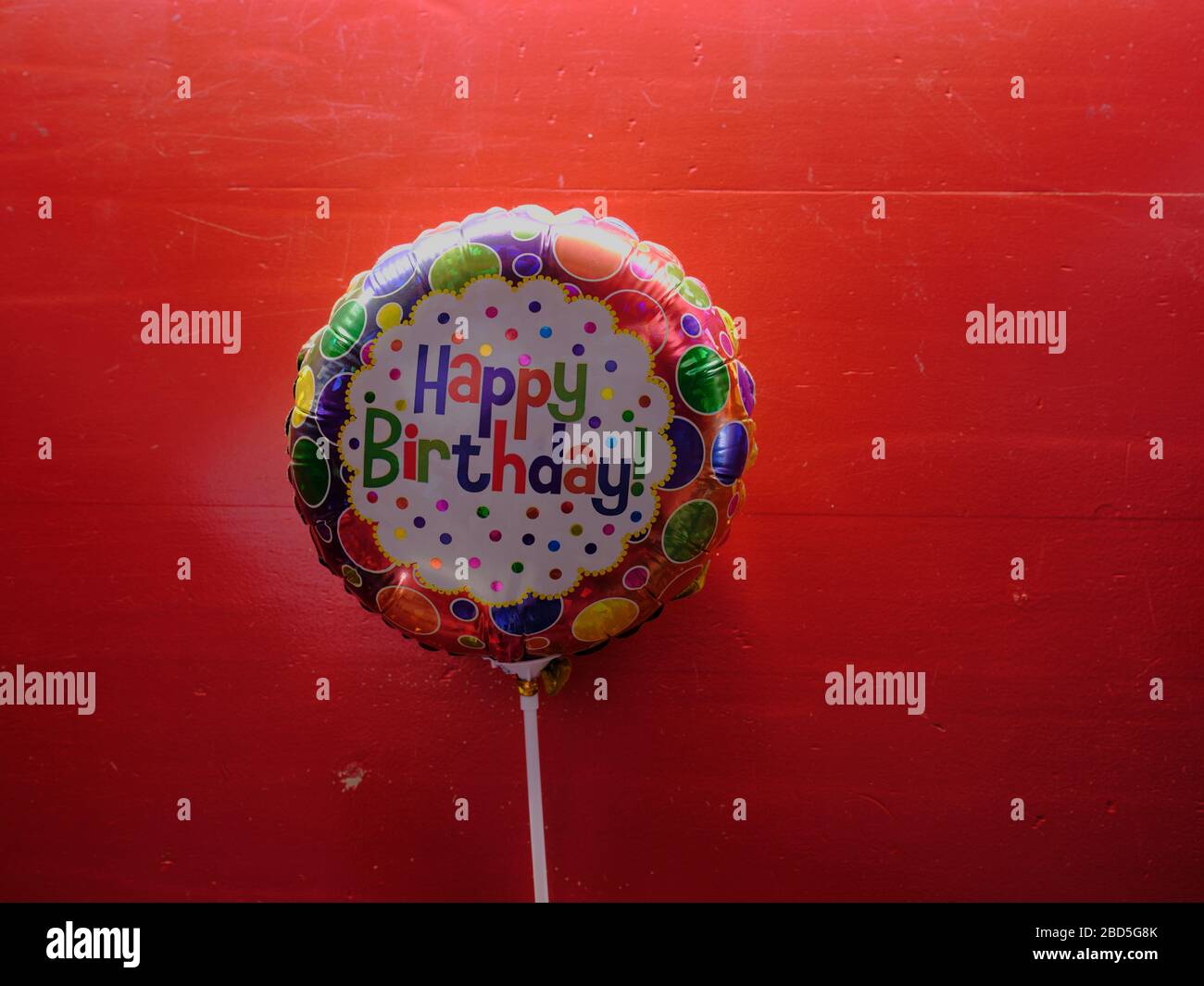 High resolution photo of a single party balloon with the words 'Happy ...