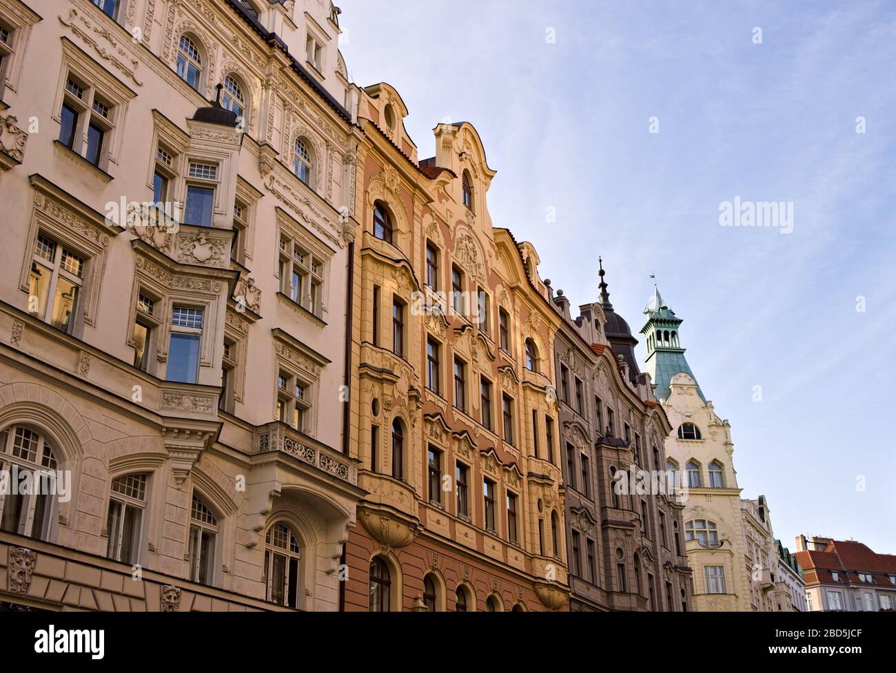 Baroque and bohemian buildings with decorated facades in Prague (Czech ...