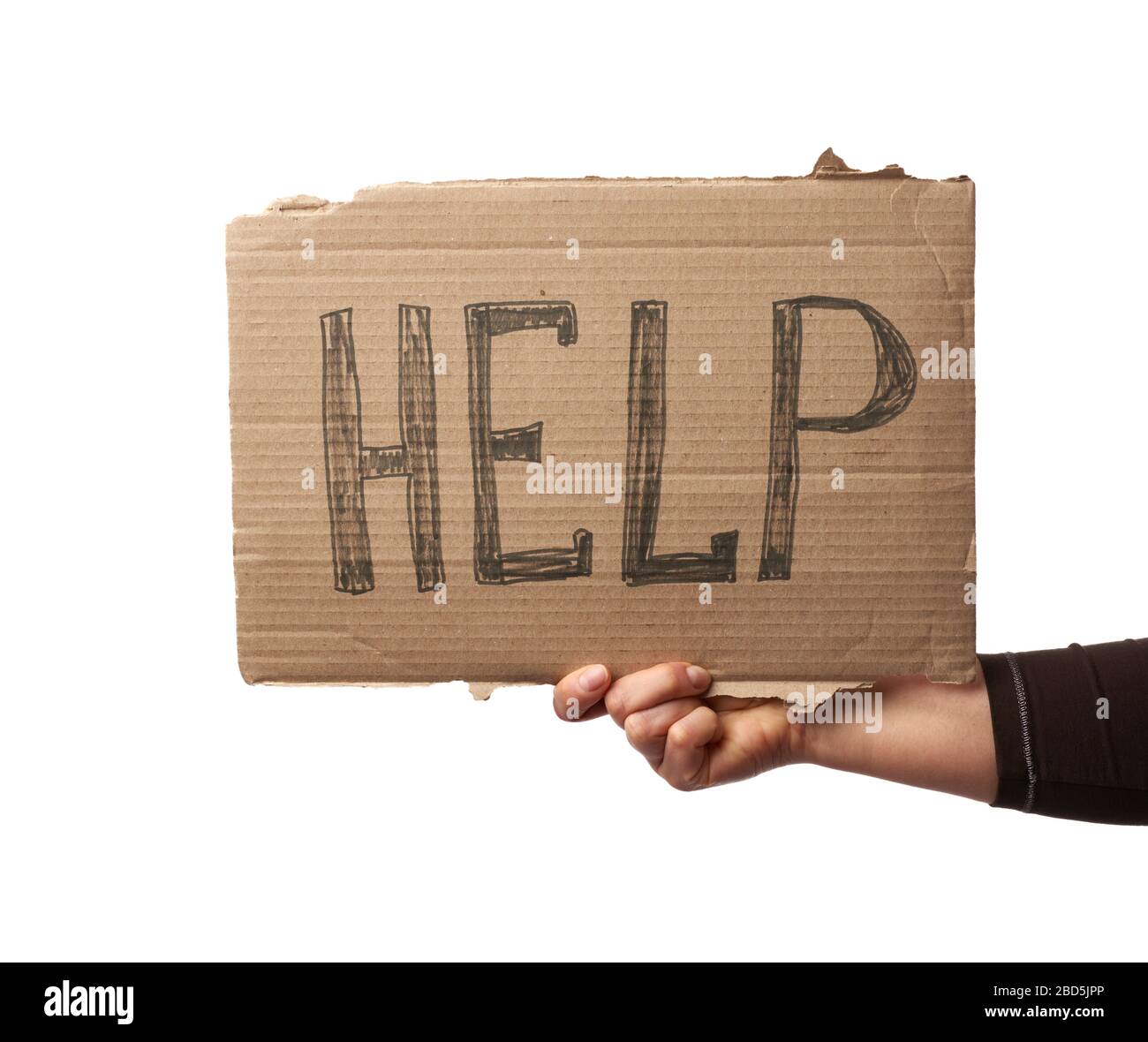 hand holds a piece of cardboard with the inscription help, mutual ...