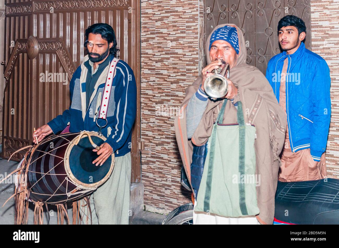 Punjabi dhol players in the street, Medhi procession to the groom home ...