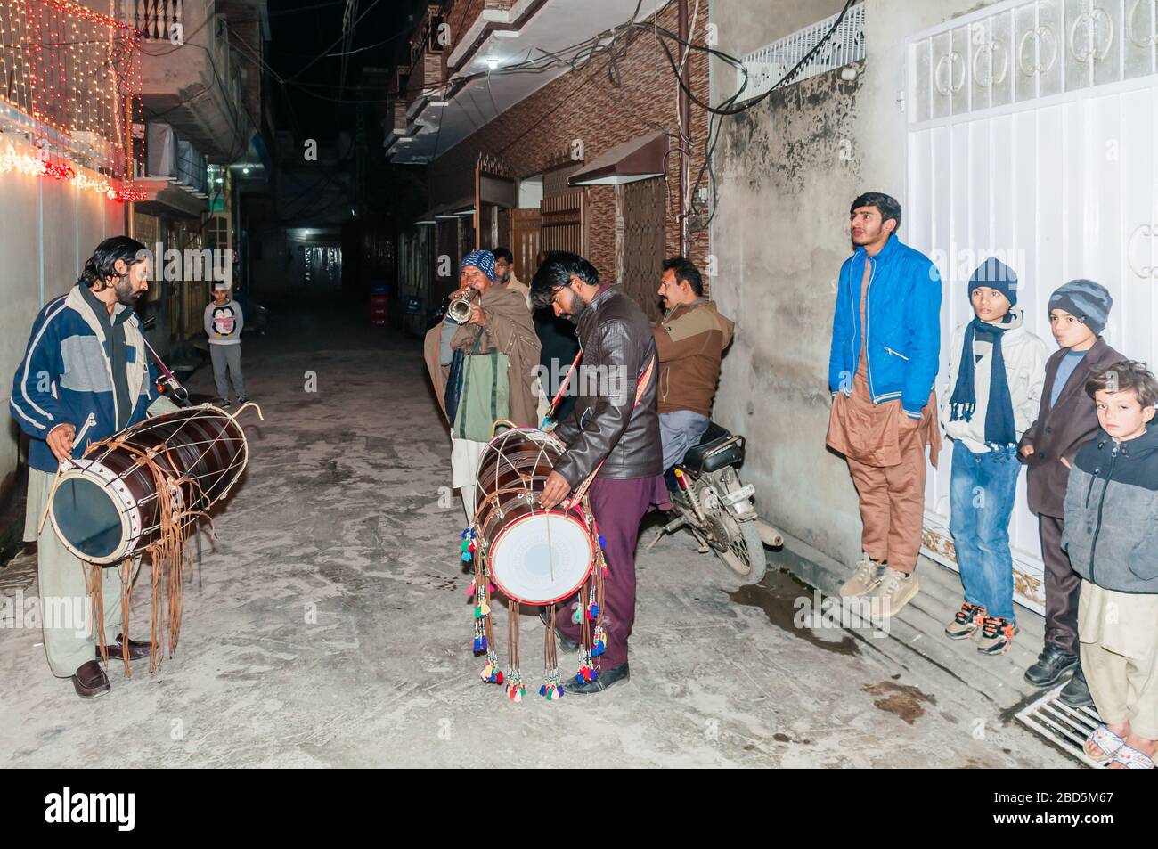 Punjabi dhol players in the street, Medhi procession to the groom home ...
