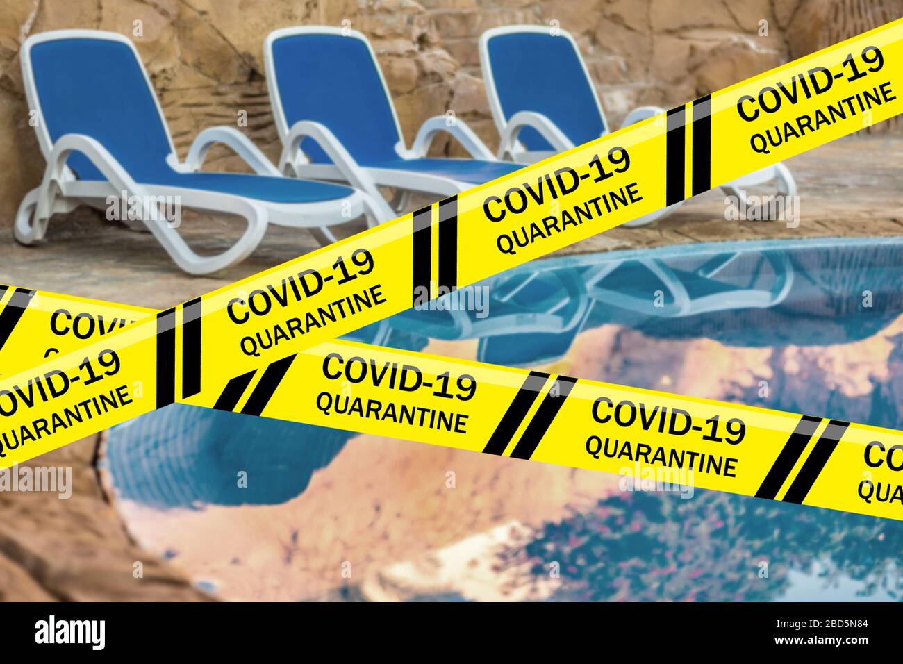 Biohazard Coronavirus warning tapes against three sun loungers and ...