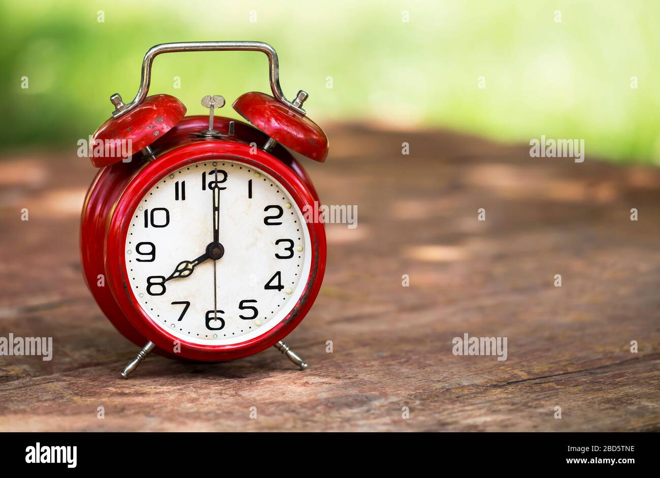 Back to school time, alarm clock in the morning, background with copy ...