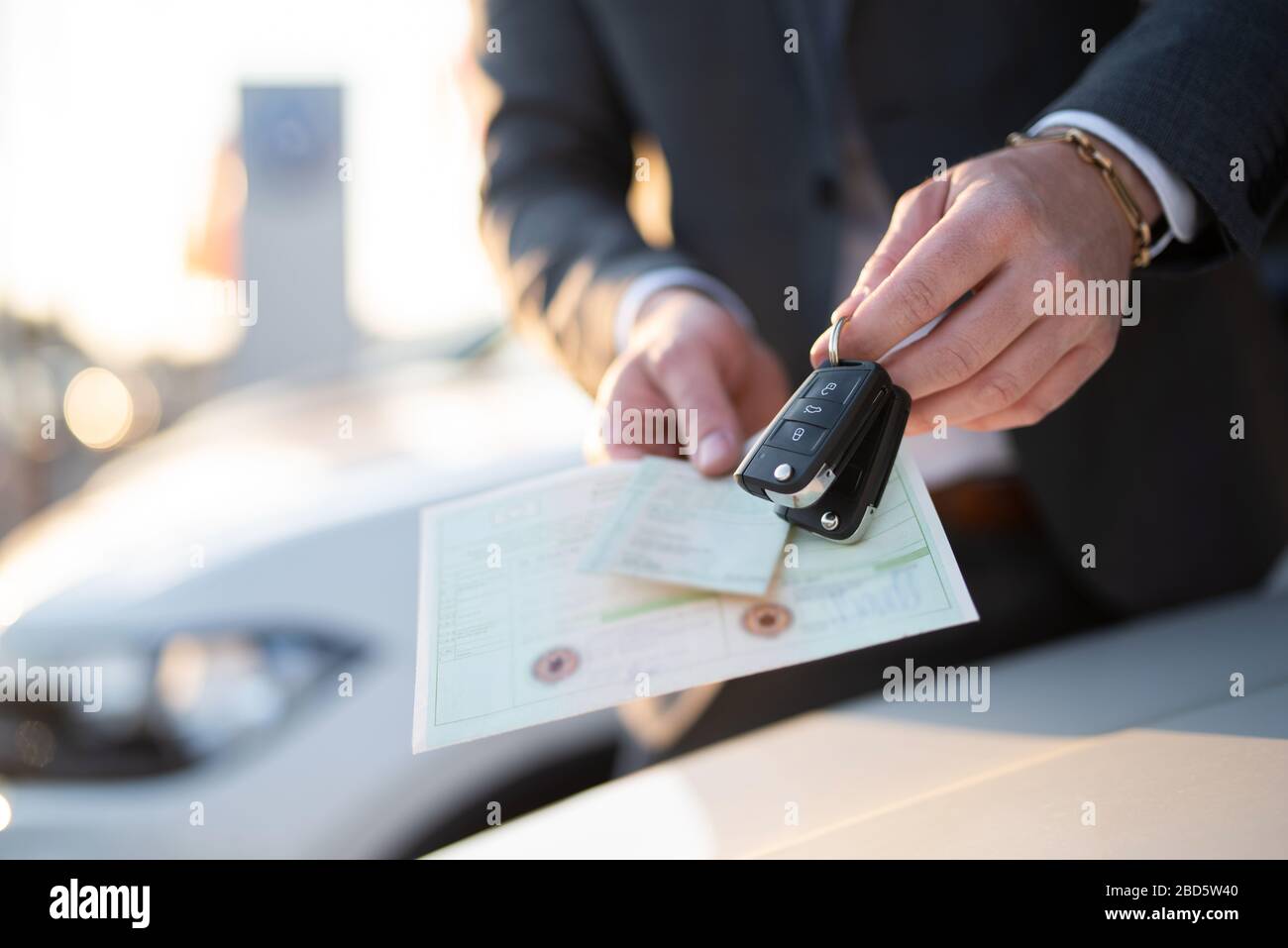 Car salesman at work Stock Photo - Alamy