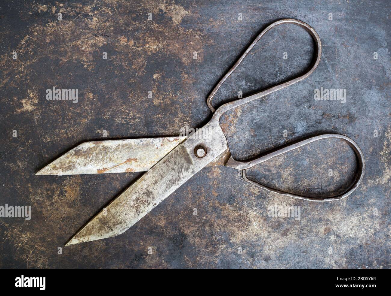 Cut concept, ancient opened scissors on metal background Stock Photo ...