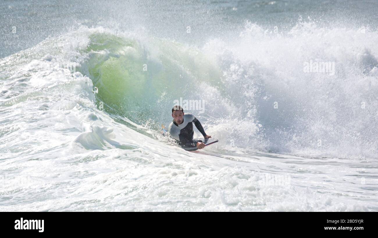 Praia de faro algarve surf hi-res stock photography and images - Alamy