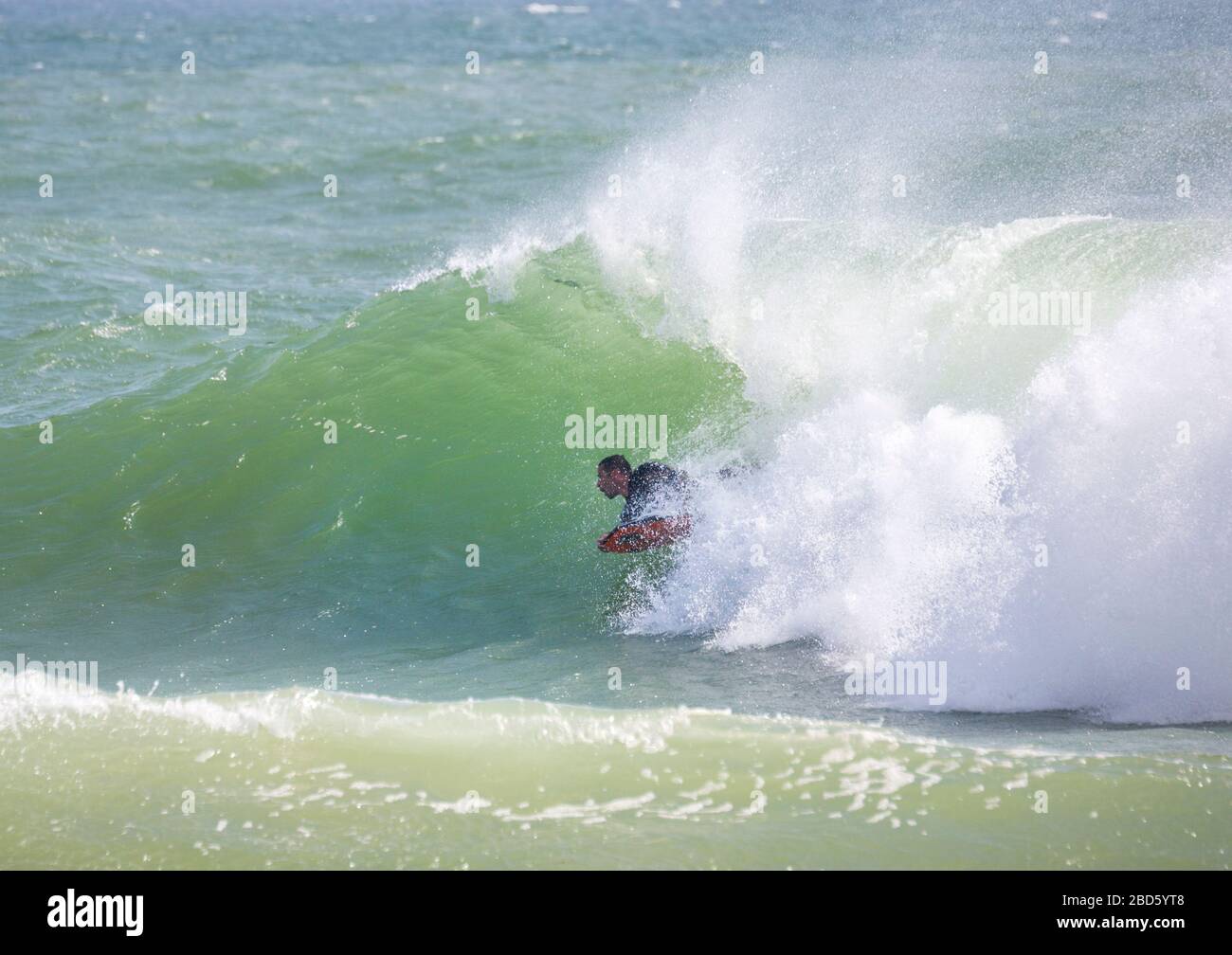Praia de faro algarve surf hi-res stock photography and images - Alamy