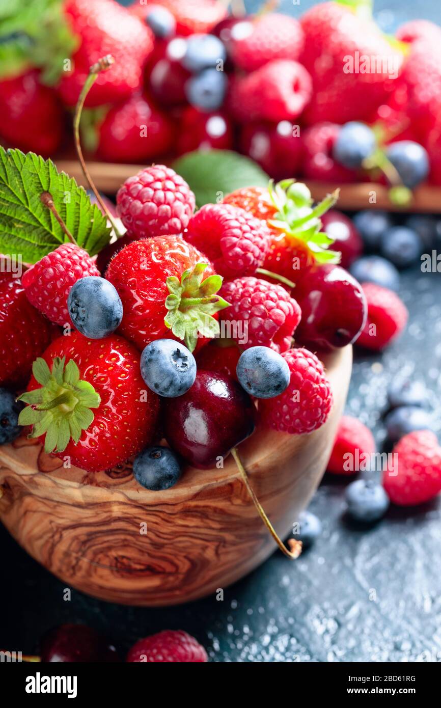 Colorful assorted mix of strawberry, blueberry, raspberry and sweet ...