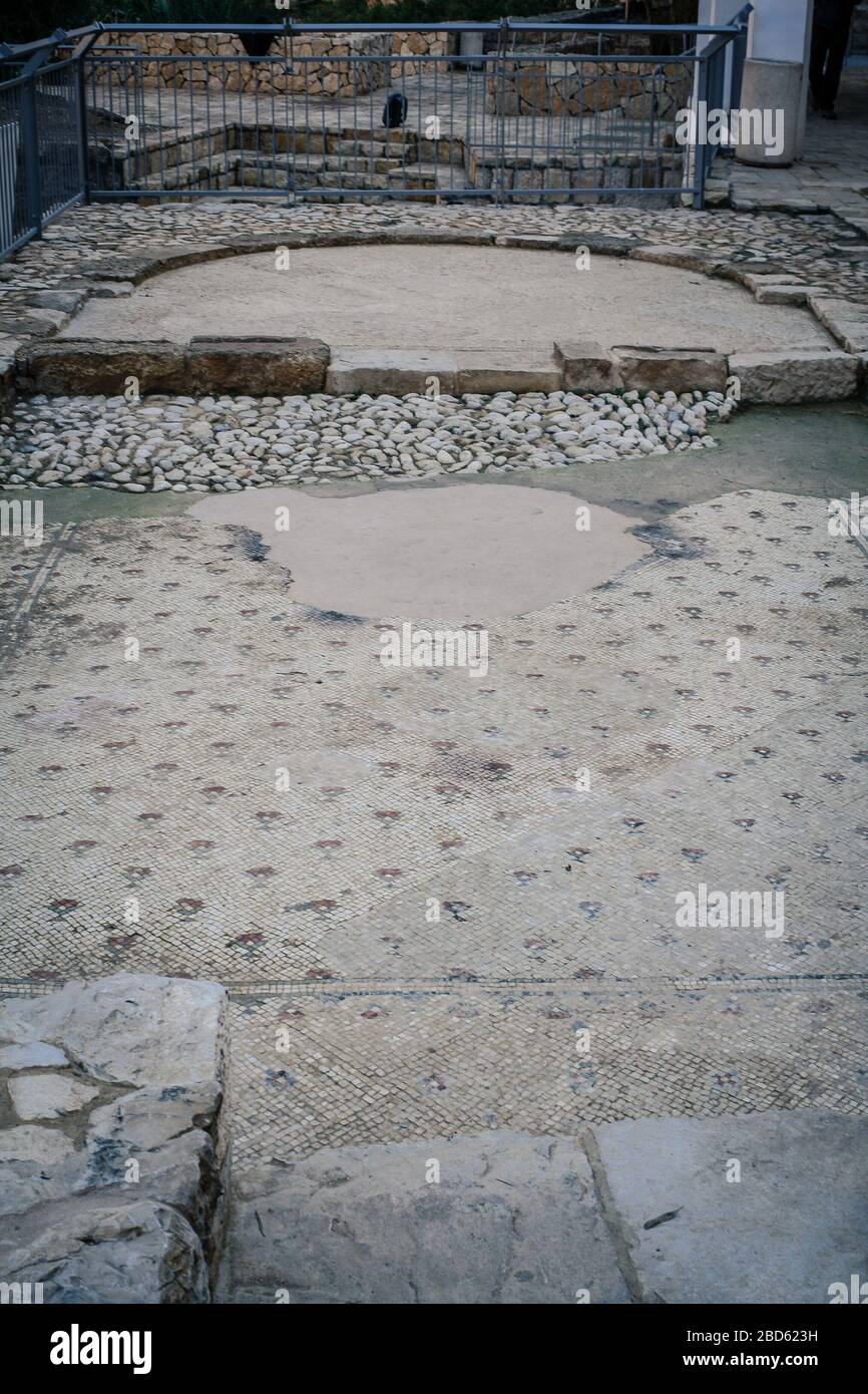 The spring flows into a natural rock pool, and its output (around 1500 ...