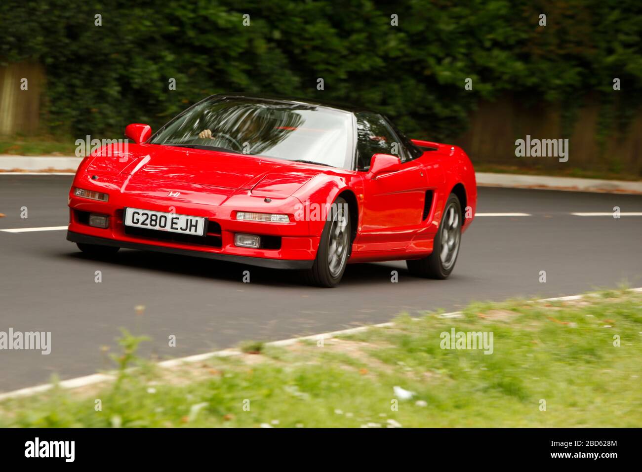 Honda NSX supercar driving at speed Stock Photo - Alamy