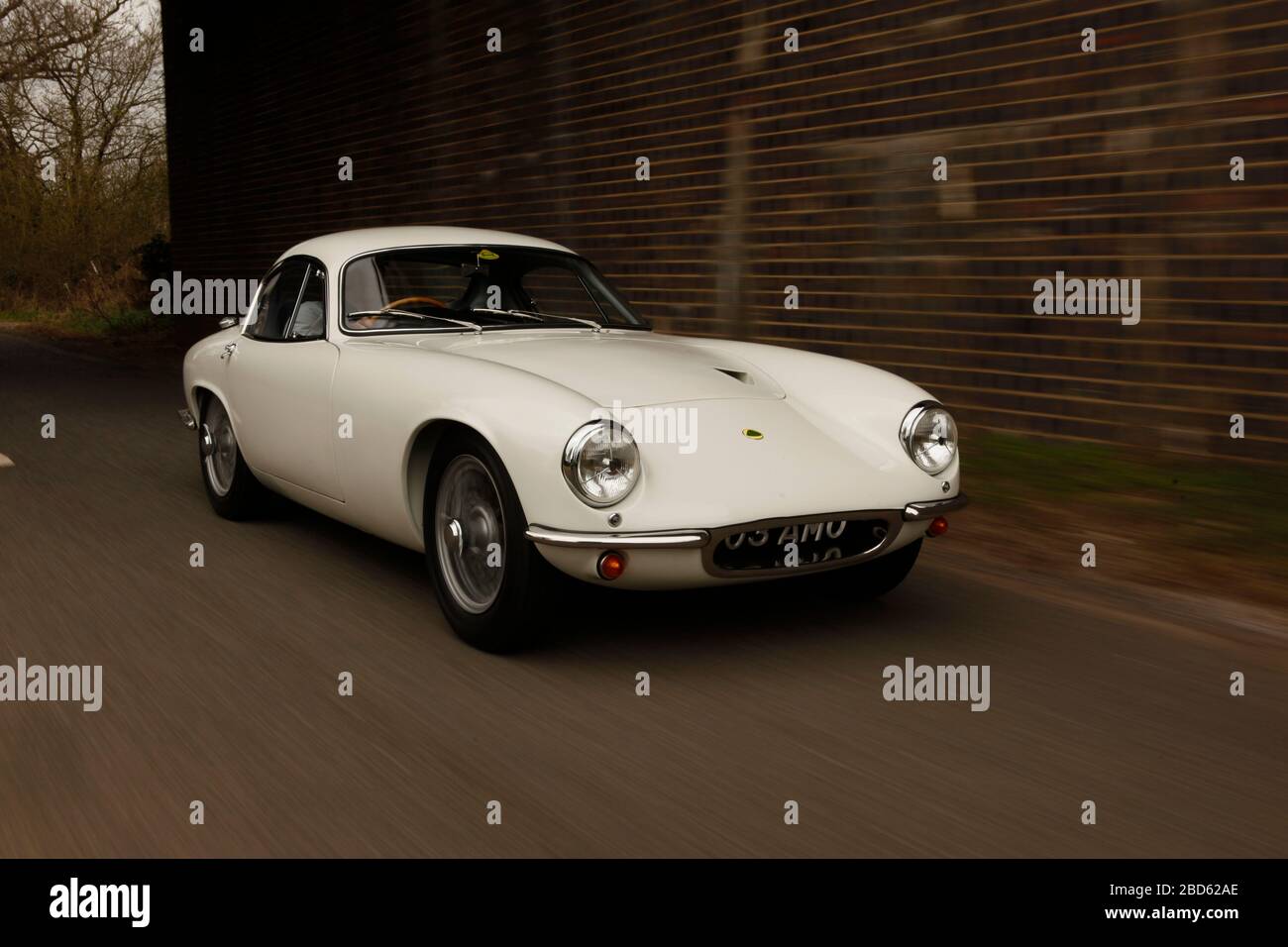 Lotus Elite British classic car driving at speed Stock Photo - Alamy
