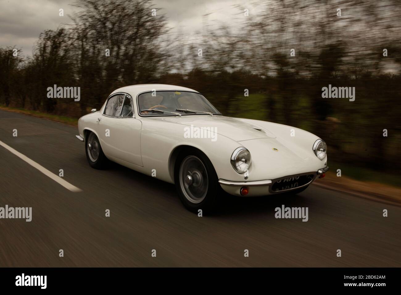 Lotus Elite British classic car driving at speed Stock Photo - Alamy