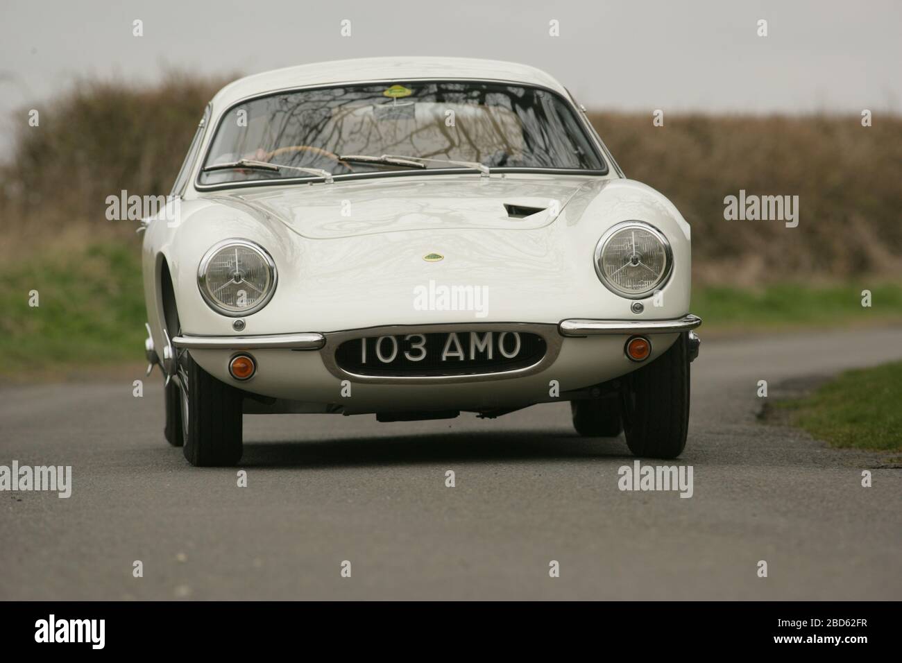 Lotus Elite British classic car driving at speed Stock Photo - Alamy