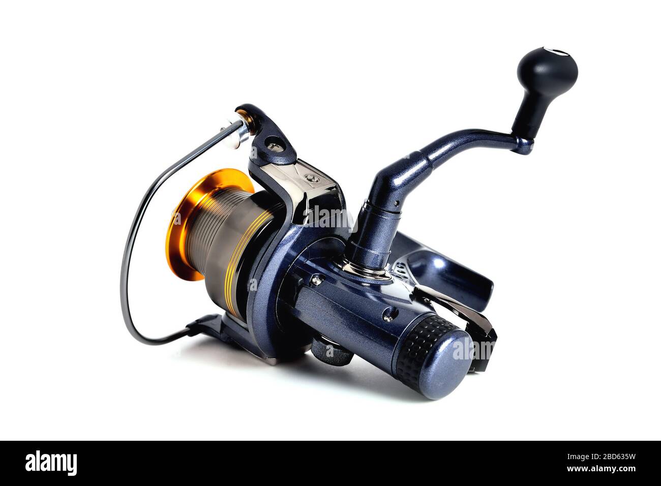 Coil for fishing inertial blue color on white background close-up ...