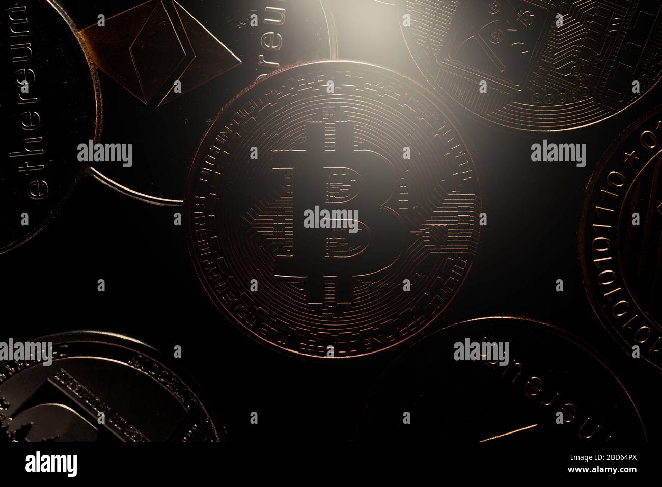 Bitcoin on black background. Photo in the dark key. New currency in the ...