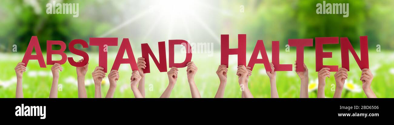 People Hands Holding Word Abstand Halten Means Keep Distance, Grass ...