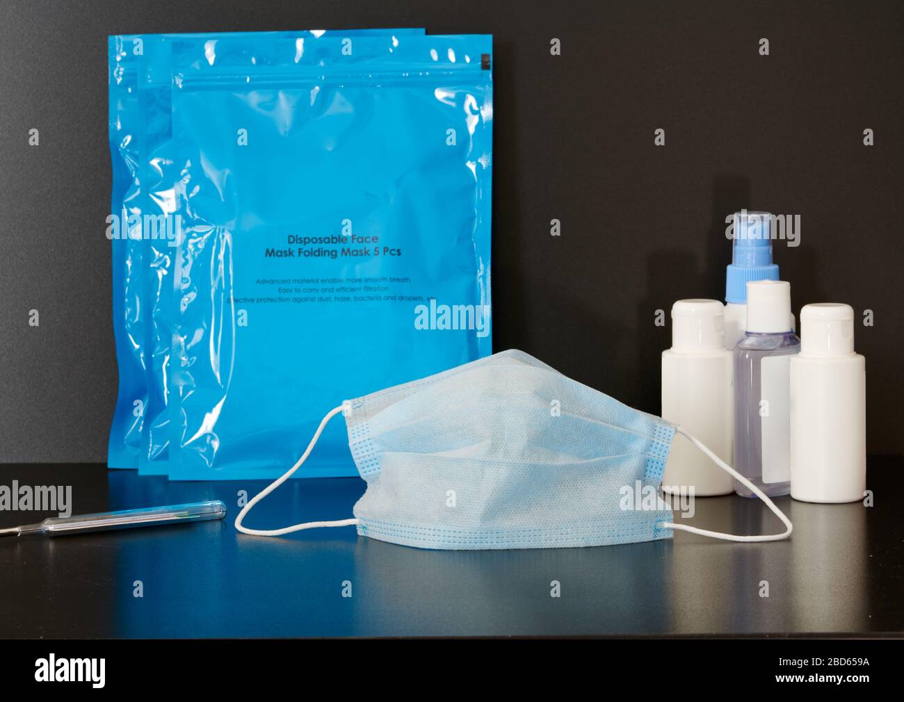 Disinfectant thermometer face mask hi-res stock photography and images ...
