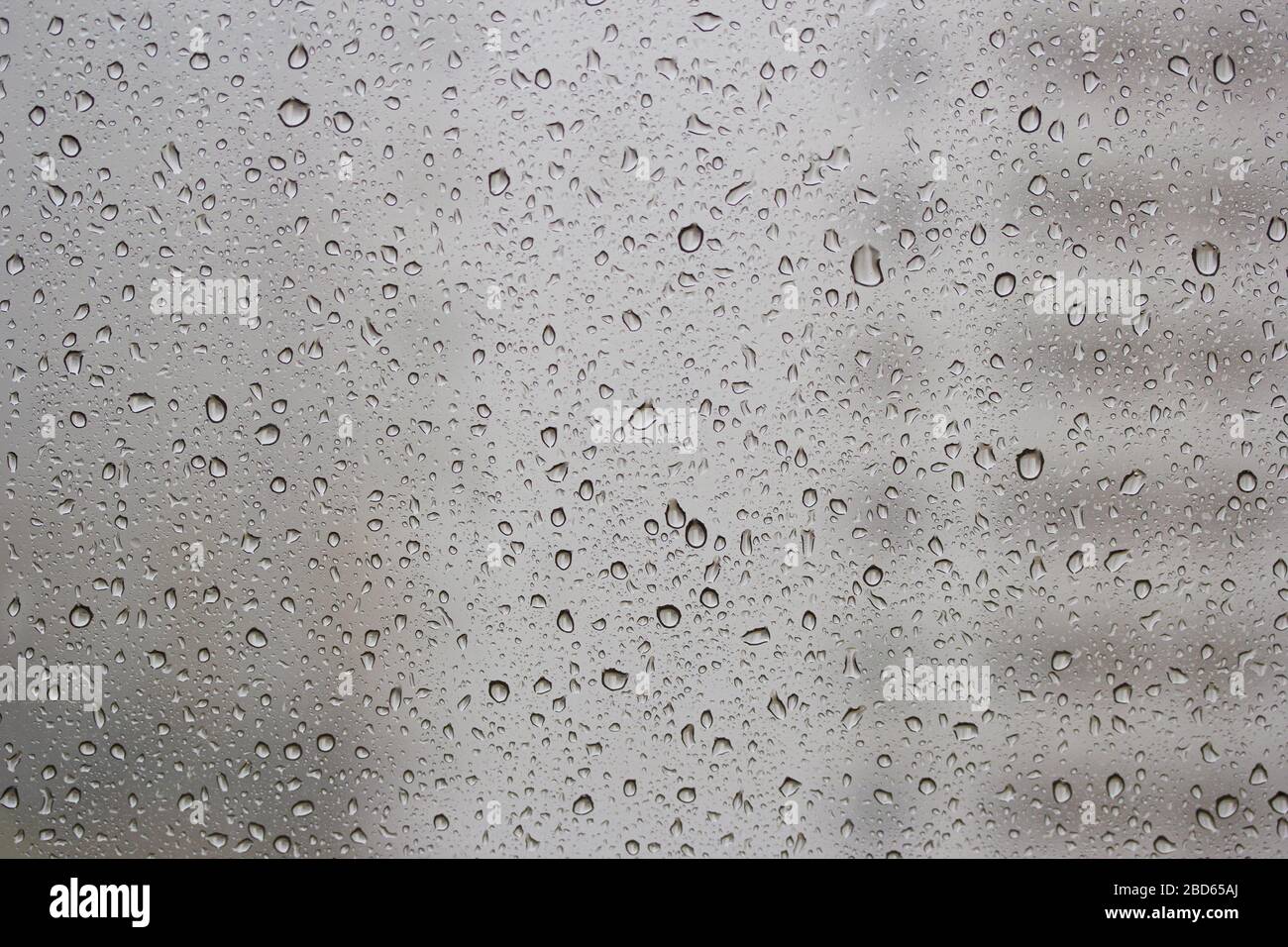Texture of raindrops running down the glass Stock Photo - Alamy