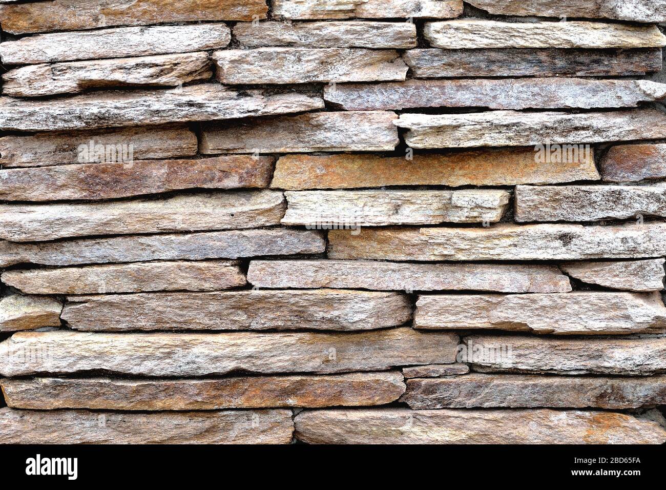 Brown stone wall, background, texture, rectangular natural stones of ...