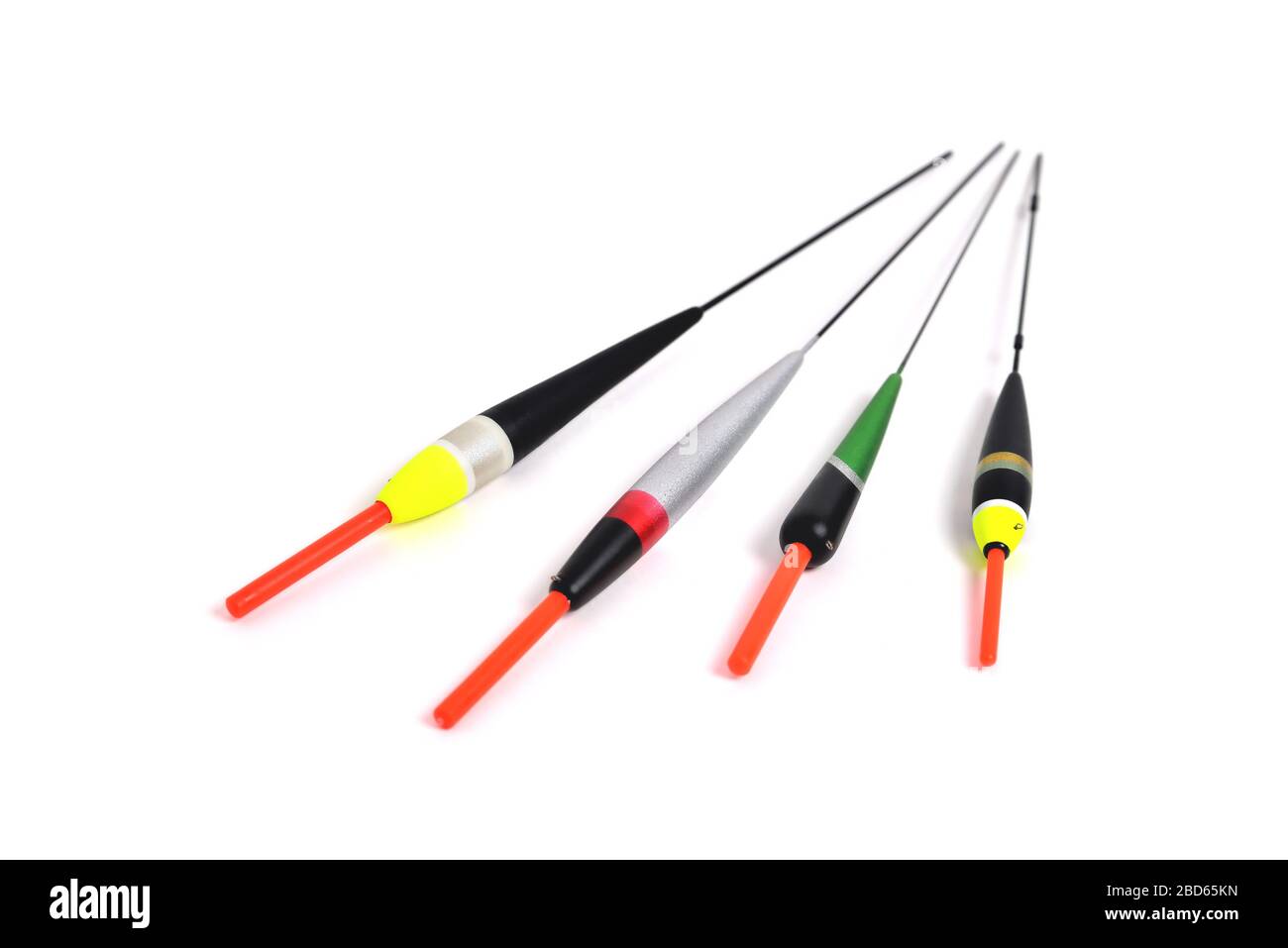 fishing floats of different shapes and colors on a white background ...
