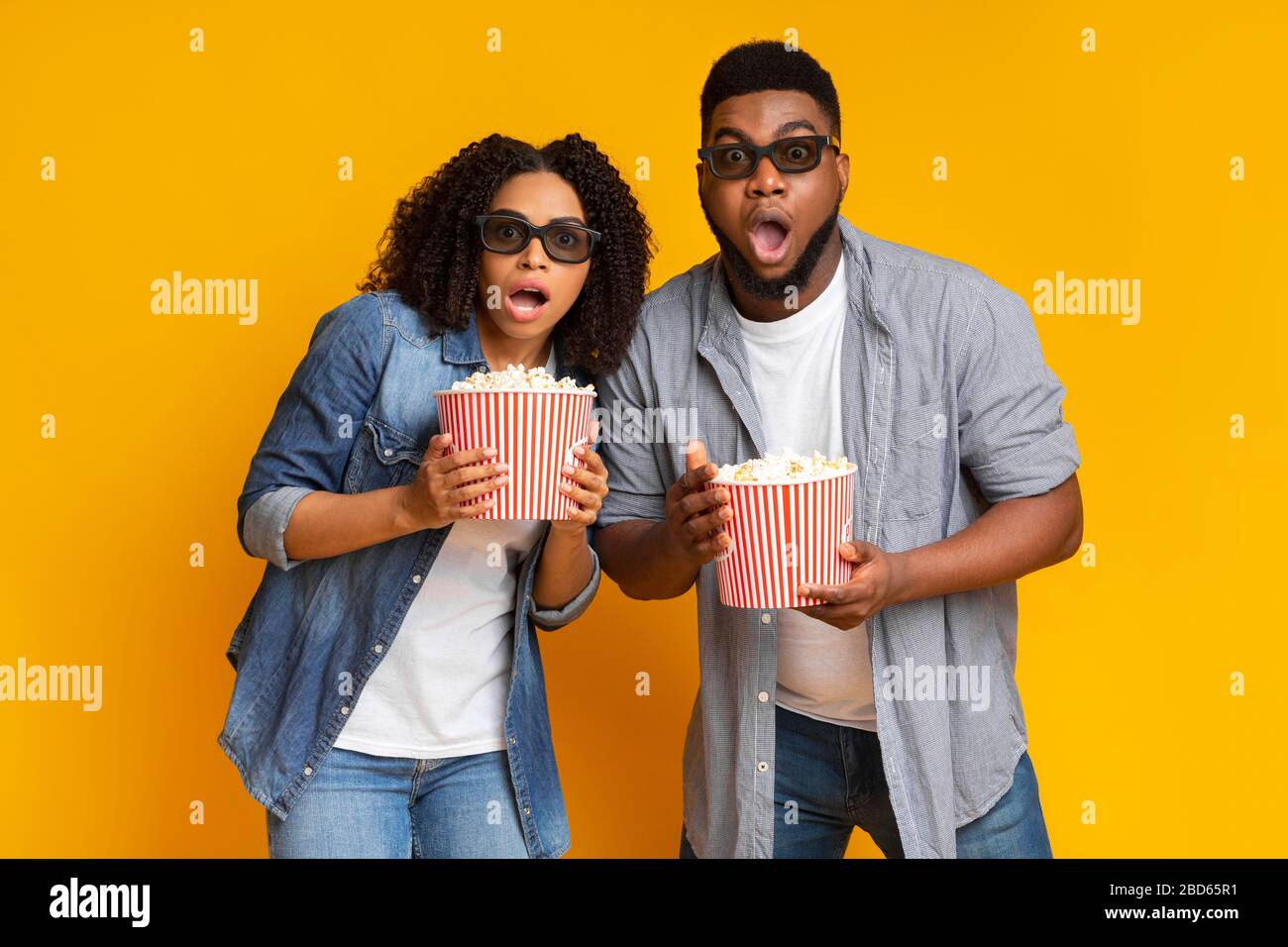 Horror Movie. Black couple looking at camera with scared face ...