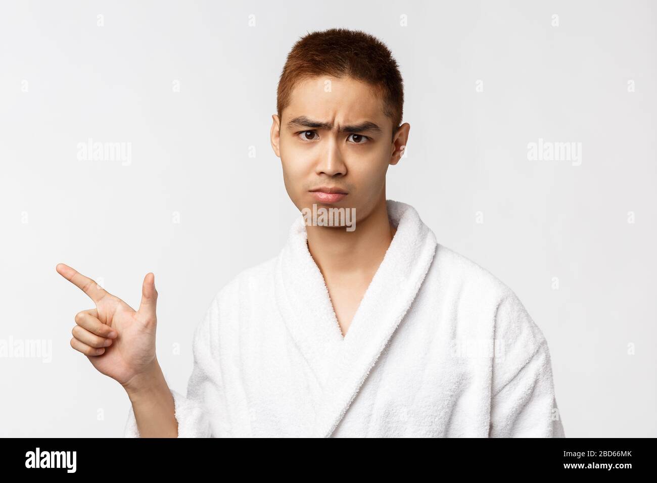 Portrait skeptical disappointed asian hi-res stock photography and ...