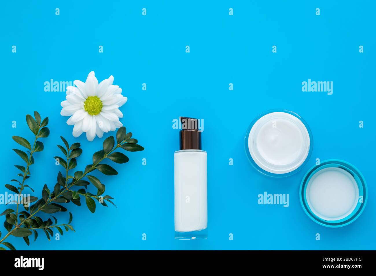 Skin care concept. Cream and lotion in glass bottle, cosmetic product ...