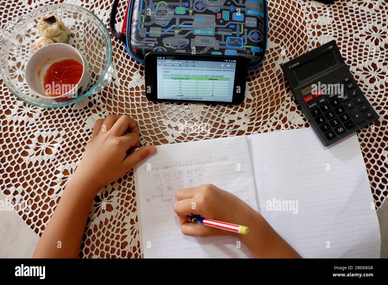 School work close up hand home asian hi-res stock photography and ...