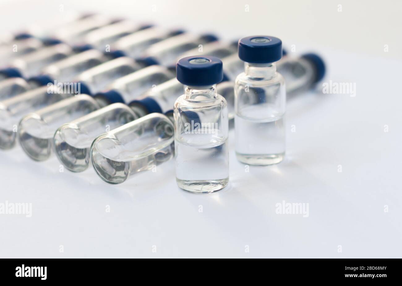 injection ampoules for vaccination on a white background, healthcare ...