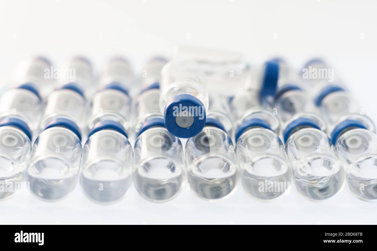injection ampoules for vaccination on a white background, healthcare ...