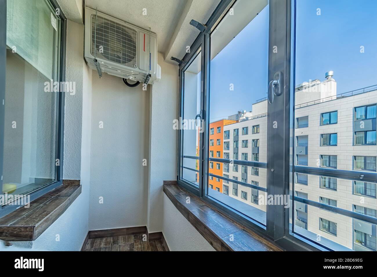 Small balcony interior in modern apartment building beige tiled floors ...