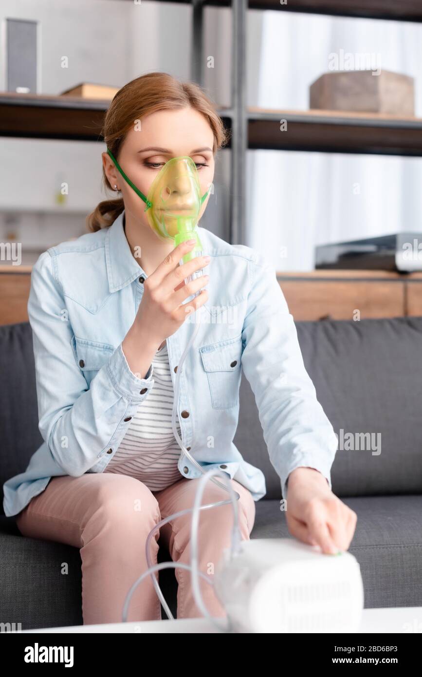 Woman using respiratory inhaler hi-res stock photography and images - Alamy