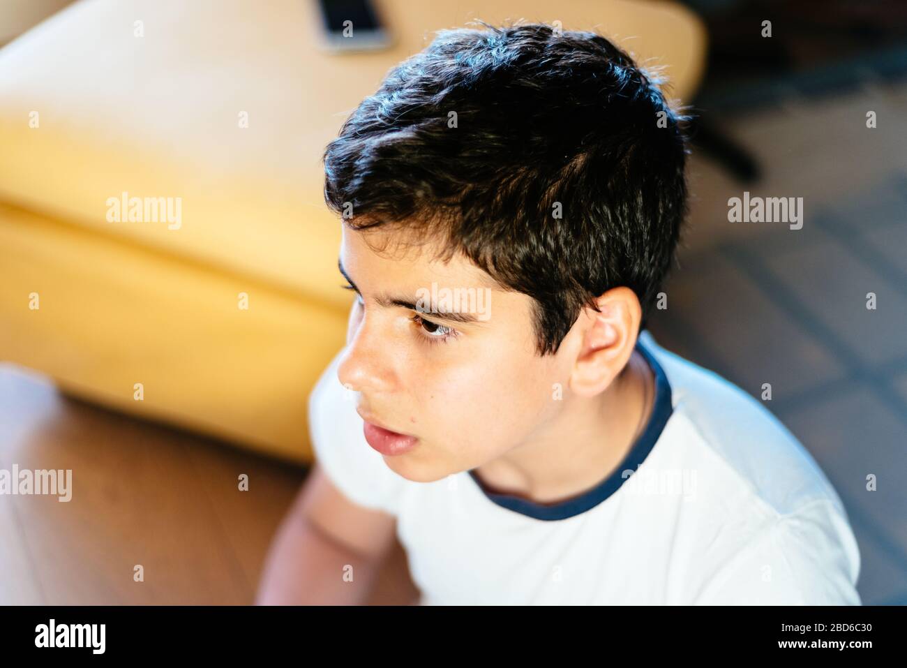 Young boy concentrating hi-res stock photography and images - Alamy