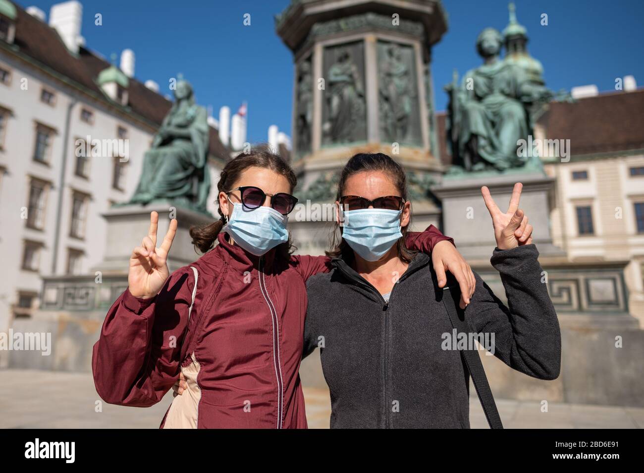 Vienna, Austria - April 04, 2020: Woman and daughter wearing a mask on ...