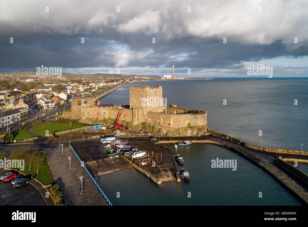 Medieval Norman Castle, harbor with boat ramp and wave breaker in ...