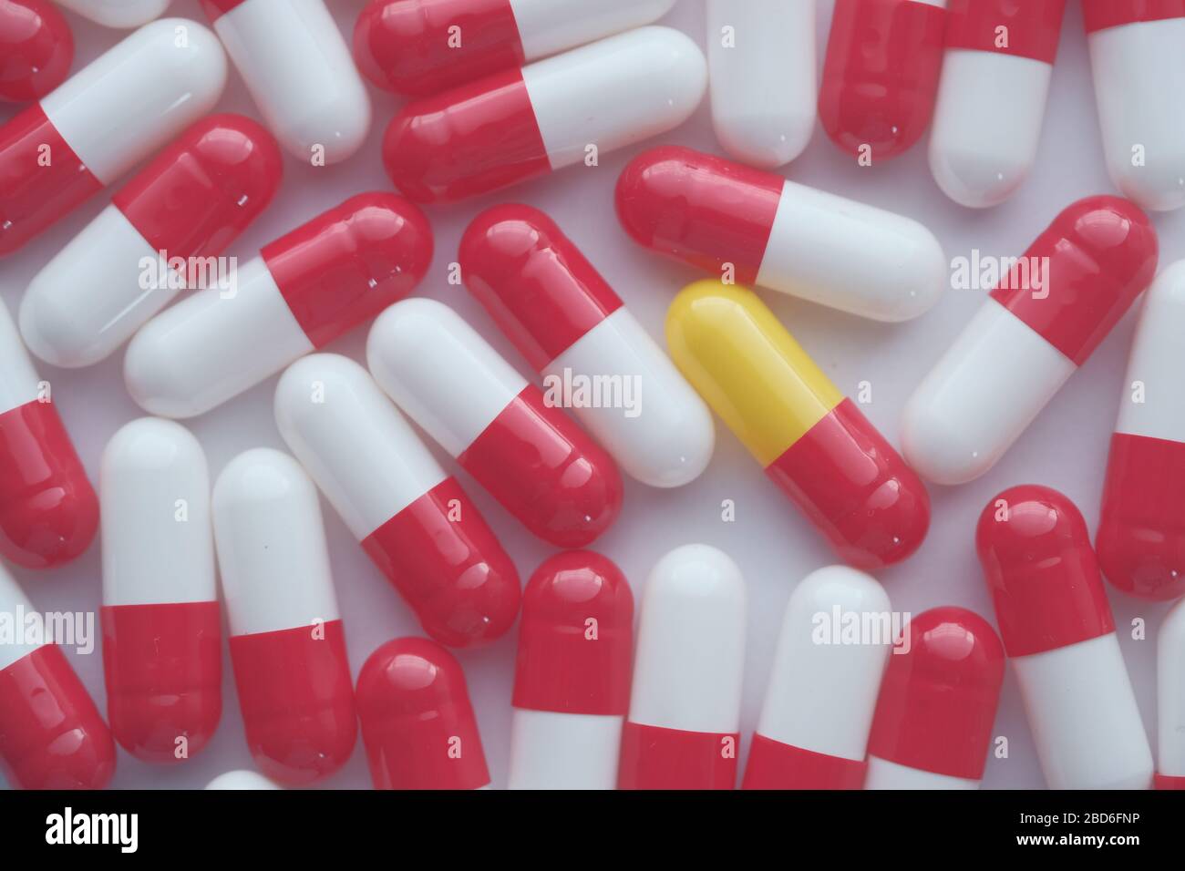 Red and white color Medicine pills and drugs, close up Stock Photo - Alamy
