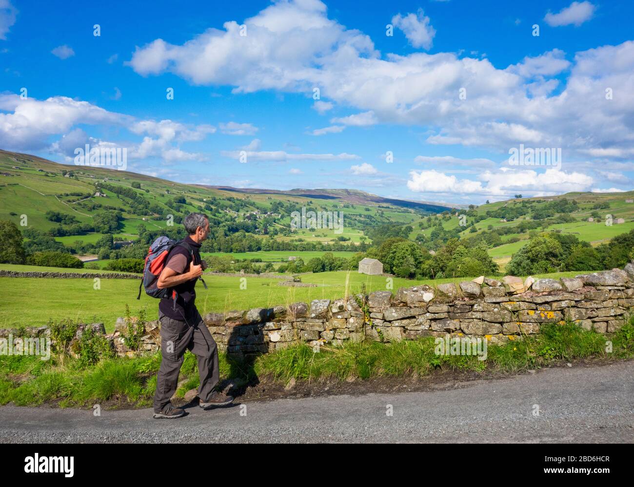Male hiker, walker near Crackpot in Swaledale in The Yorkshire Dales ...