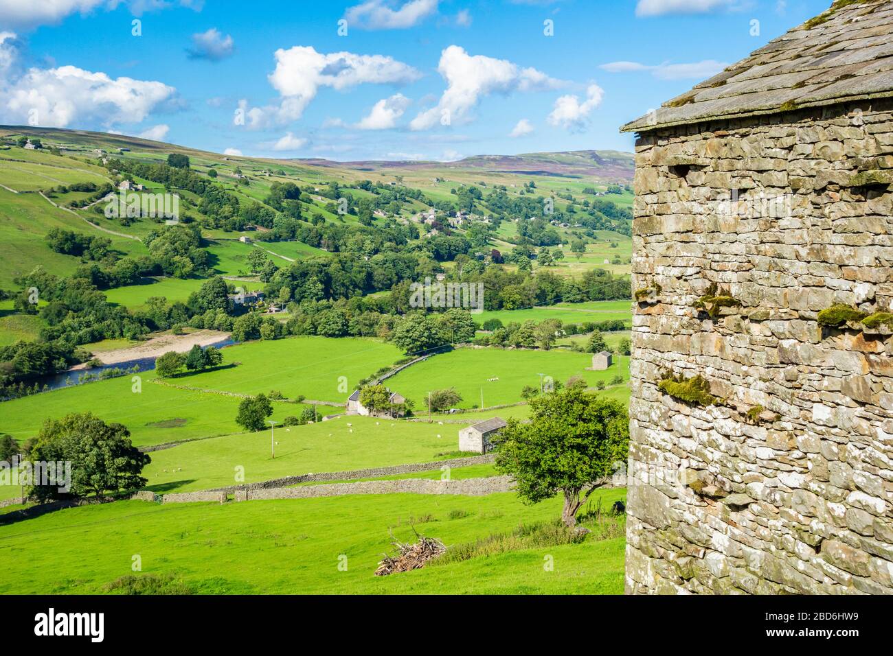 View over the river Swale towards Gunnerside village from Crackpot in ...