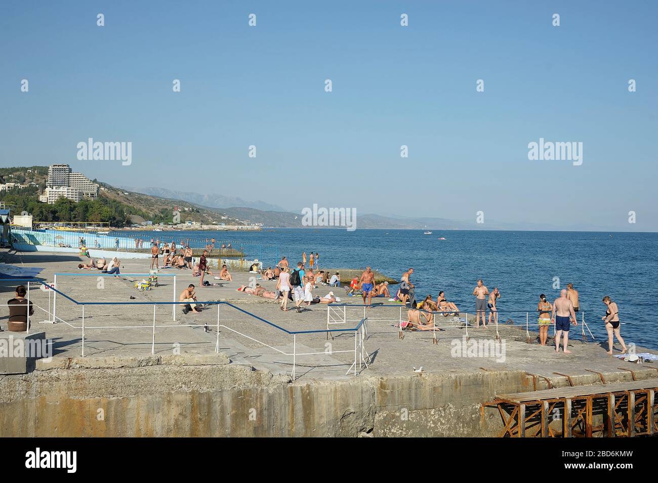 People sunbathing on a sea beach. July 12, 2018. Alushta, Crimea Stock ...