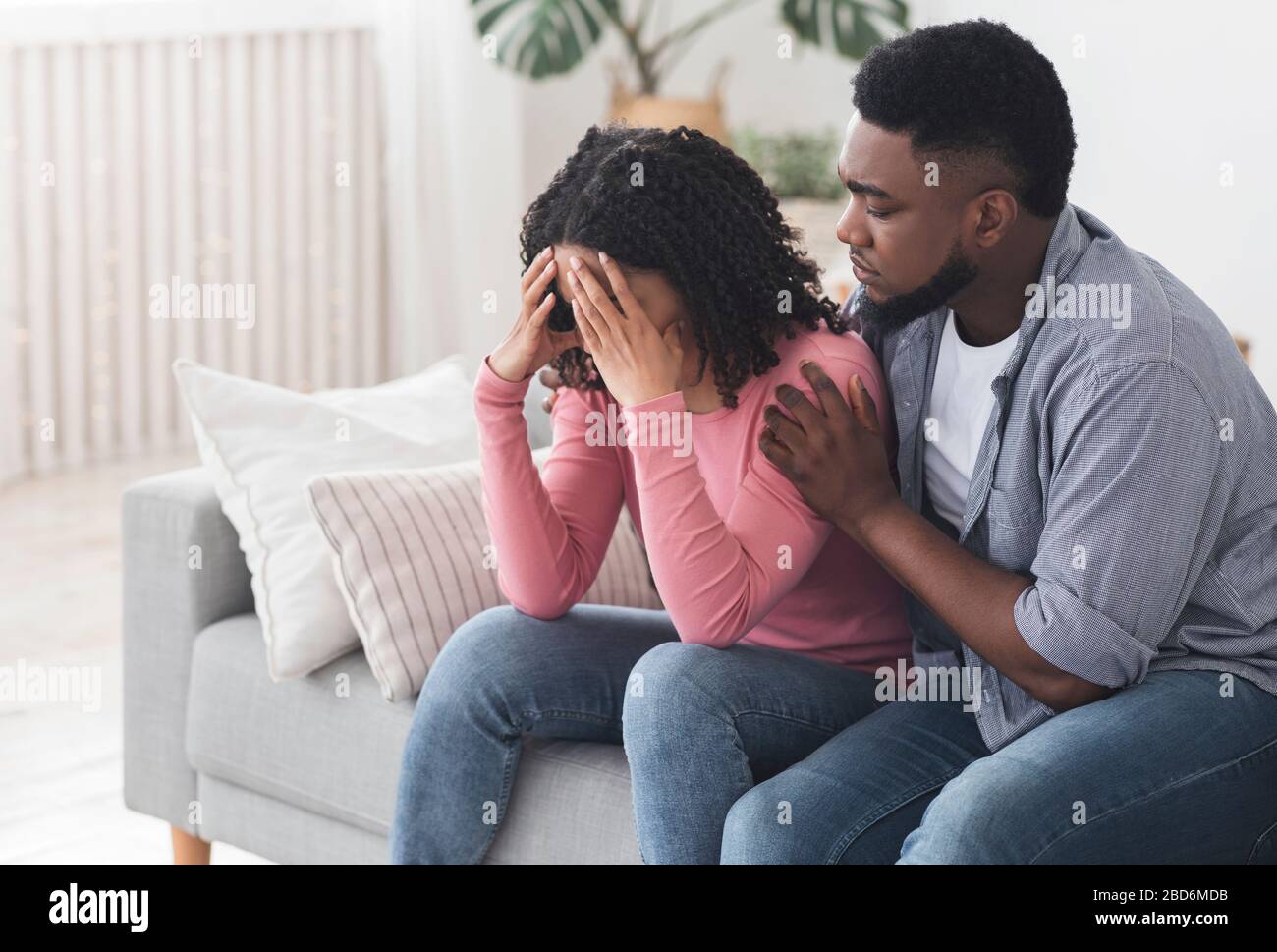 Woman Comforting Man Worried Stock Photos & Woman Comforting Man ...