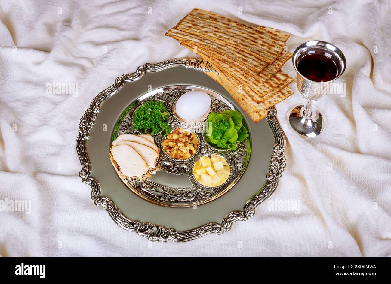 Jewish family celebrating passover matzoh jewish unleavened bread ...