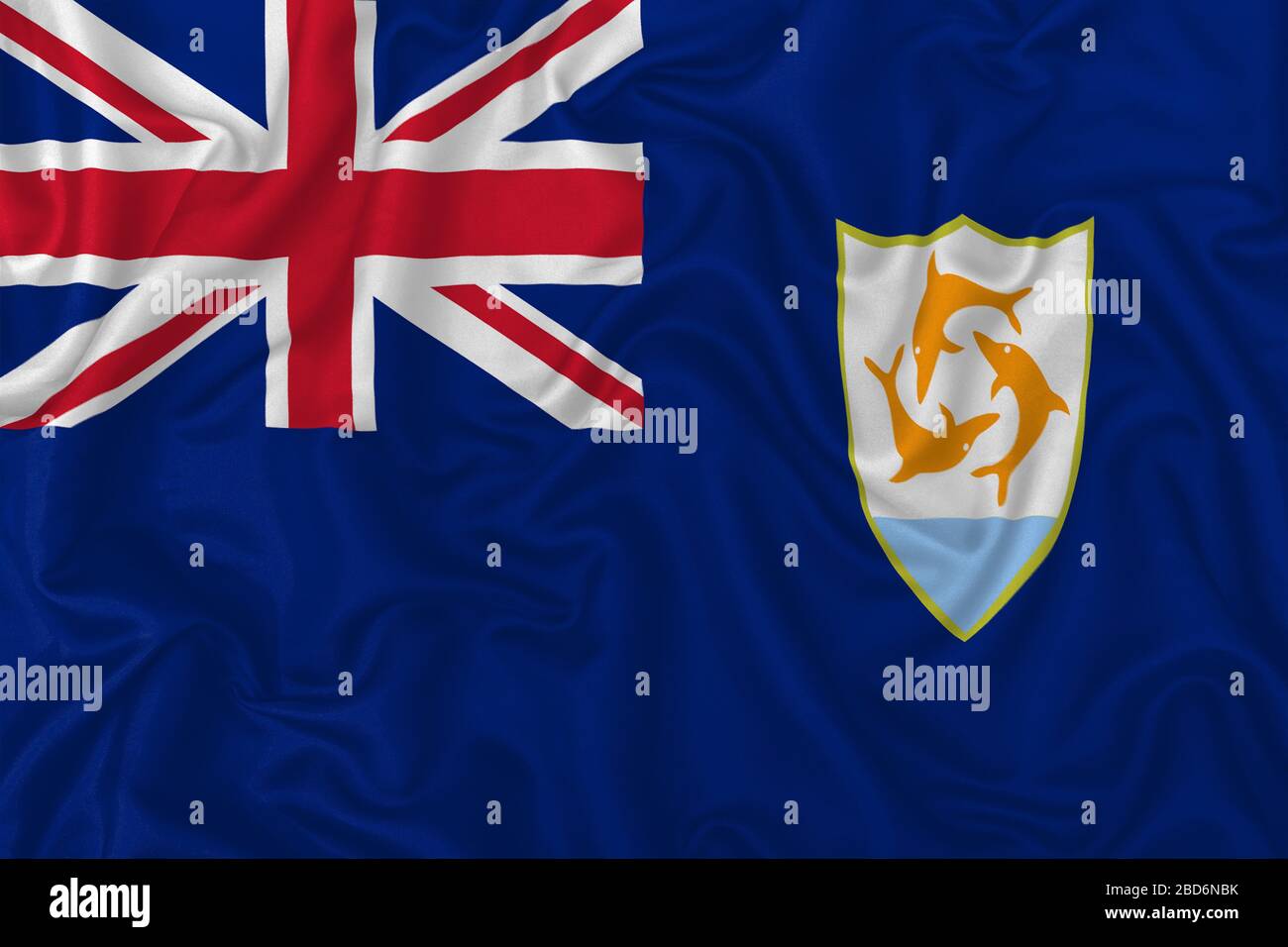 Anguilla country flag on wavy silk textile fabric background Stock ...
