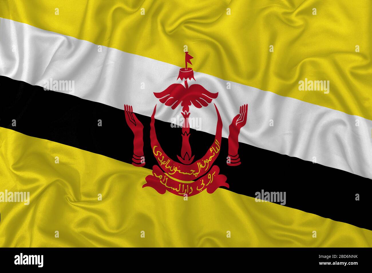 Brunei country flag on wavy silk textile fabric background Stock Photo ...