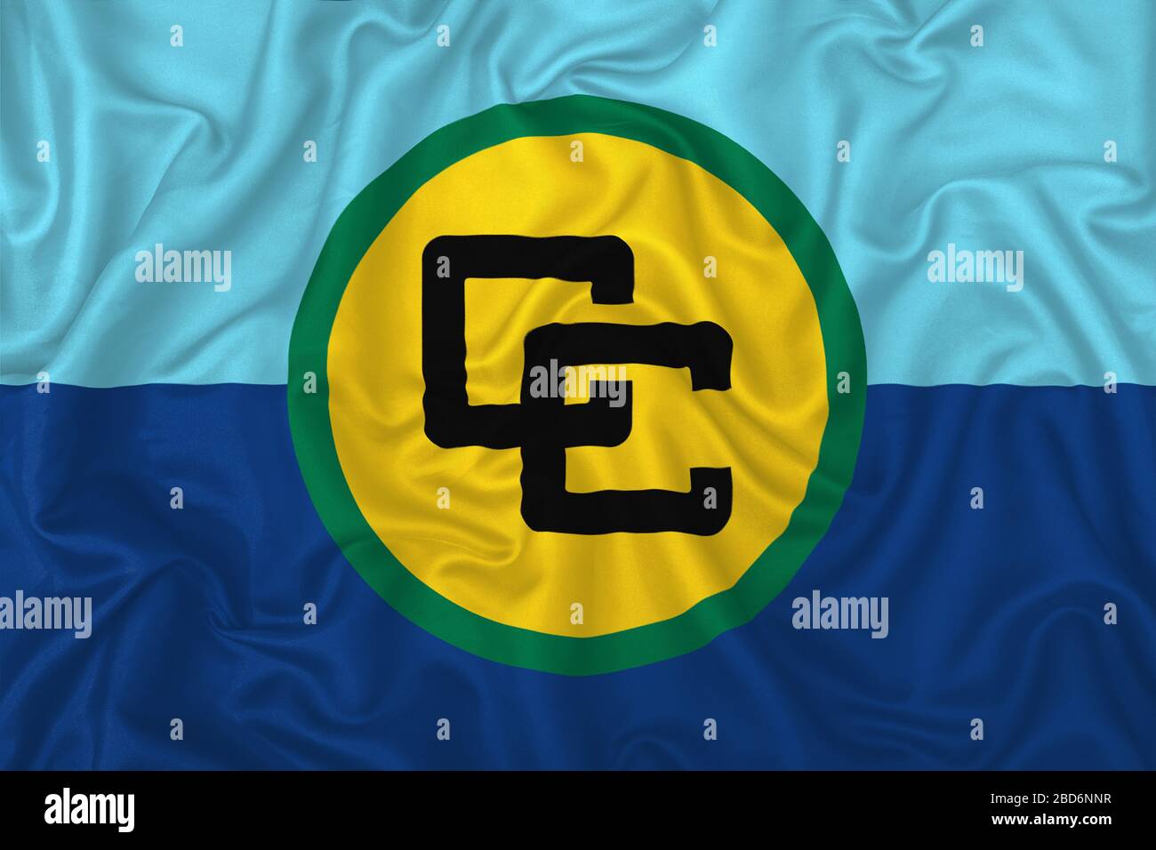 Caribbean Community flag on wavy silk textile fabric background Stock ...
